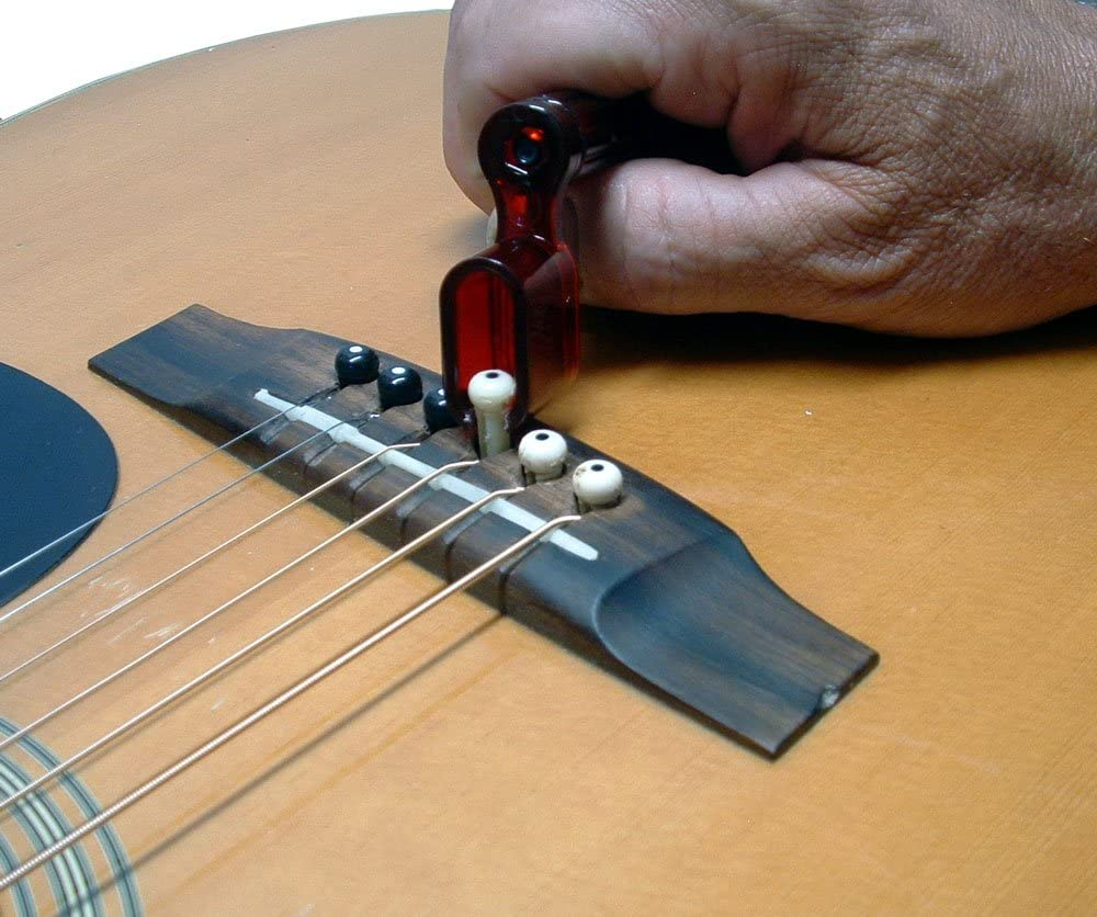 How To Restring An Acoustic Guitar - Guitar Tunio